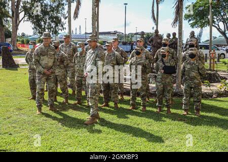 Maj. Gen. James B. Jarrard and Command Sgt. Maj. William Pouliot greets ...