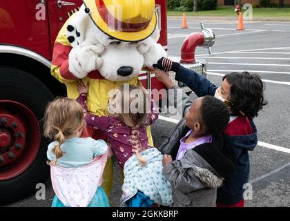 “Sparky”, The mascot of the RAF Lakenheath Fire Department, high fives ...