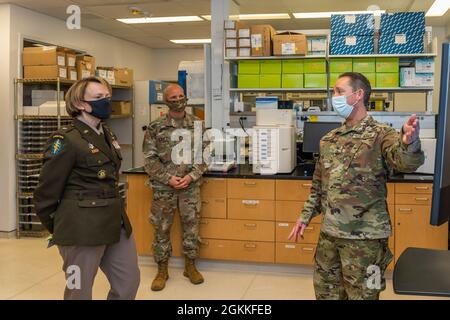 Col. Jason Bennett (right), director, WRAIR Multidrug-resistant organism Repository and ...