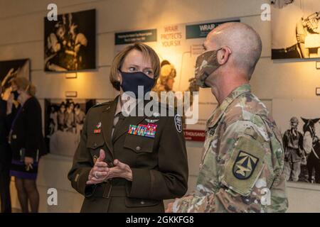 Col. Clinton Murray (right), WRAIR commander, provides an introductory ...