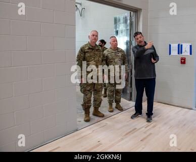 Col. Carl Magnusson, the 914th Air Refueling Wing commander, presents ...