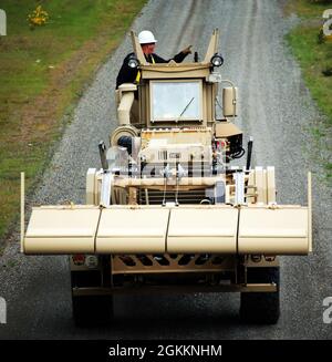 A Husky vehicle mounted mine detector Mk III is loaded onto a C-17 ...