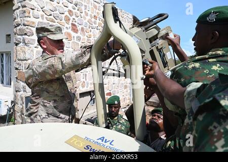 U.S. and Burundi soldiers dismantle a SIPR NIPR Access Point Terminal ...