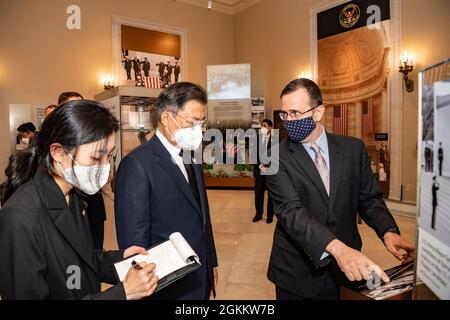 Tim Frank (center right), historian, Arlington National Cemetery; gives ...