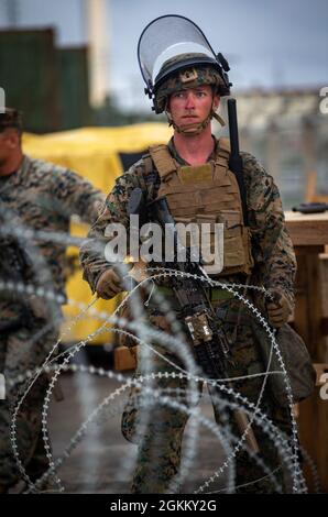 Marines from the 3rd Battalion, 5th Marine Regiment, seen relaxing ...