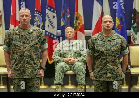 Col. Michael E. McWilliams, the outgoing commander of U.S. Marine Corps Forces, South, passes ...