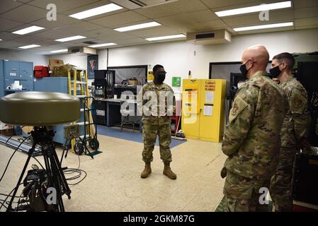 A tactical air navigation (TACAN) system van is positioned facing ...