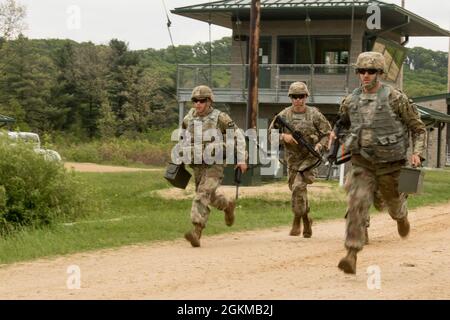 Spc. Karhal Wayman, from the Military Intelligence Command, records a ...