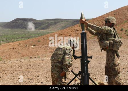 U.S. forces and French soldiers participate in the closing ceremony ...
