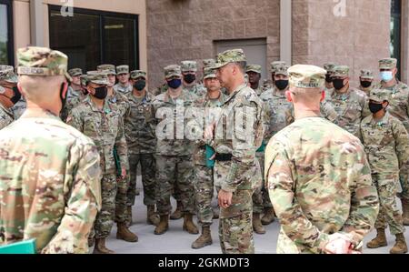 Maj. Gen. Sean Bernabe, senior commander, 1st Armored Division talks to ...