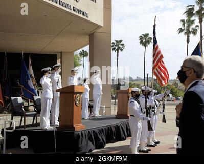 Capt. Devin Morrison salutes Capt. Kimberly Davis as she takes the helm ...