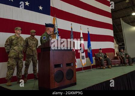 Col. Matthew Gaetke, 51st Operations Group inbound commander, receives ...