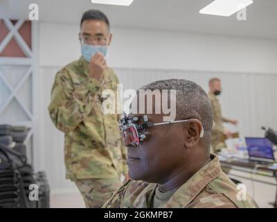U.S. Army Capt. Albert Chen, an Optometrist and Detachment Commander ...