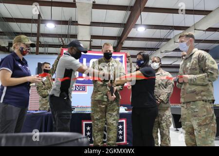 Command Sgt. Maj. Brian Disque, senior enlisted advisor of Area Support Group Kuwait, speaks to ...