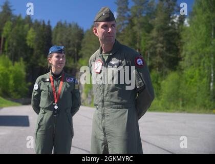 Finnish Air Force Lt. Col. Inka Niskanen (left), commanding officer of ...