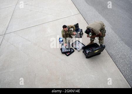 Senior Airman Elijah Turner and Senior Airman Clayton Roppa, 911th ...