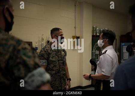 U.S. Marine Corps Col. Omar Randall views the deployable manufacturing ...