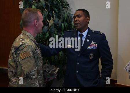 Col. Marcus Jackson, Buckley Garrison commander, and his family pose ...