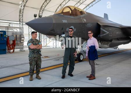 Maj. Robert Ahern (left), a pilot with Marine Fighter Attack Squadron ...