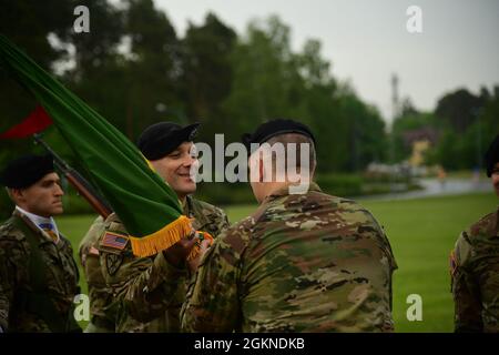 Incoming Brigade Commander Colonel Chad A. Froelich receives the 18th ...