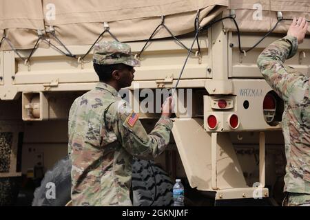 Soldiers from the 372nd Engineering Construction Company from Pewaukee ...