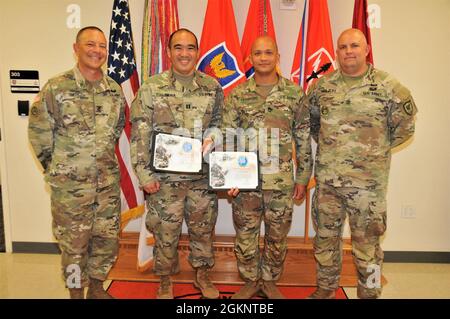 From left to right, Capt. Jonathan E. Newbold, Capt. Jameson Norton ...