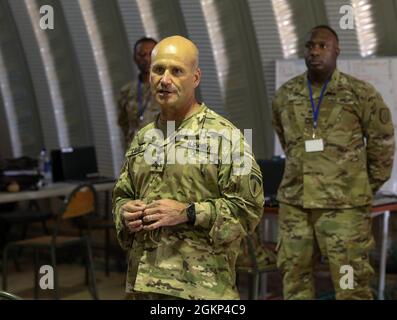General Christopher G Cavoli, and Command Sergeant Major Robert V ...