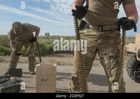 Soldiers from the 183rd Helicopter Assault Battalion prepare ammunition ...