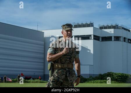 U.S. Marine Corps Col. Omar Randall, left, off-going commanding officer ...