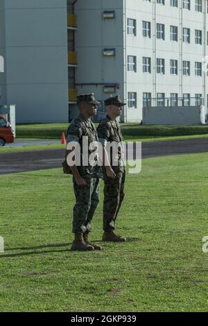 U.S. Marine Corps Col. Omar Randall, left, off-going commanding officer ...