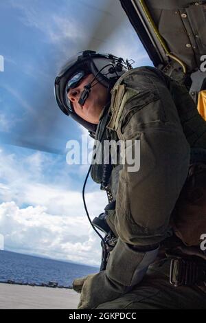 Naval Air Crewman (Helicopter) 1st Class Dylan McCallum, assigned to ...