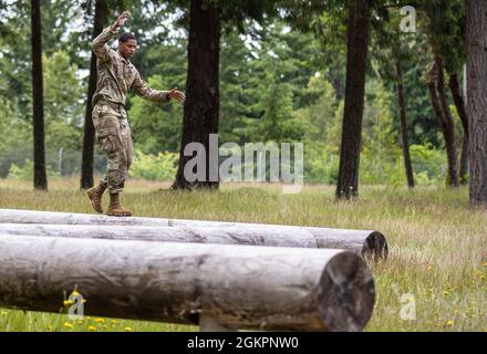 Sgt. Phadria Burnett, from Madigan Army Medical Center swings through ...