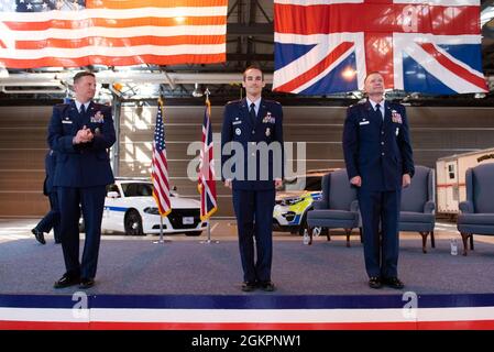 U.S. Air Force Maj. Daniel Merkh, right, 423rd Security Forces Squadron incoming commander ...