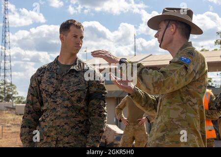 Australian Army Gen. Angus Campbell, center, Chief of the Defence Force ...