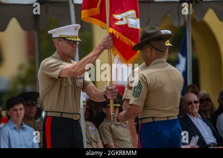 SgtMaj. Abel T. Leal hands over the colors to BGen. Ryan P. Heritage ...