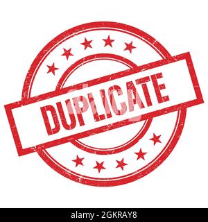 DUPLICATE text on red round grungy texture stamp Stock Photo - Alamy