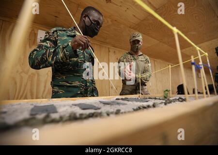 Members of the Guyana Defence Force (GDF) observe joint parachute ...