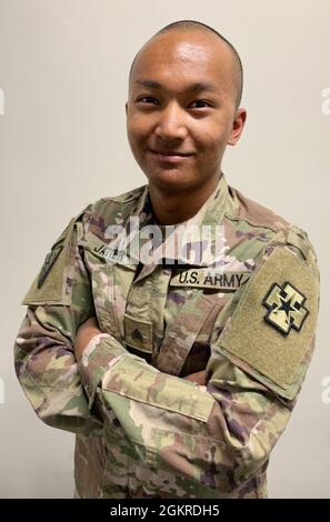 U.S. Army Sgt. Jason Javier (left), a veterinary food noncommissioned ...