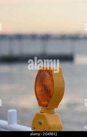 Selective focus shot of an orange warning light on a panel Stock Photo ...