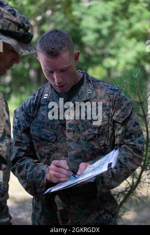 U.S. Marine Corps Capt. Devon Sanderfield, an infantry officer with 2d ...