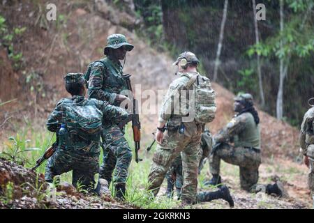 Members of the Guyana Defence Force (GDF) observe joint parachute ...