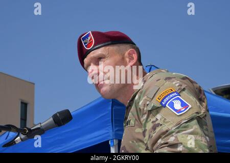 U.S. Army Col. Michael Kloepper, commander of the 173rd Airborne Brigade, and Command Sgt. Maj ...