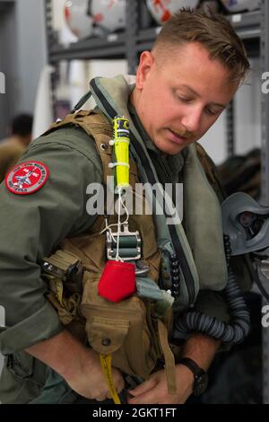 U.S. Marine Corps Capt. Daniel Tagliarini, left, and Staff Sgt. Charles ...