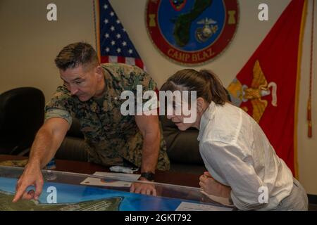 Lt. Col. Tate Buntz, the Marine Corps Base (MCB) Camp Blaz Operations Officer, briefs ...