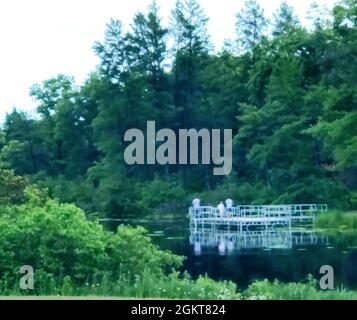Anglers try fishing June 26, 2021, at Swamp Pond at Fort McCoy, Wis ...