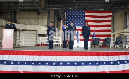 Lt. Gen. Timothy Haugh, left, 16th Air Force commander, applauds with ...