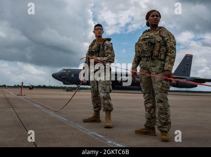 Airmen from the 2nd Bomb Wing and the 76th Expeditionary Depot ...