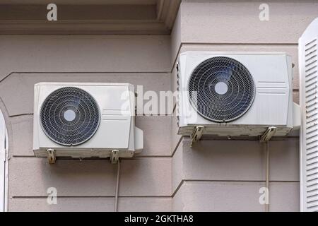Two Big Air Conditioner Units at House Exterior Wall Stock Photo - Alamy