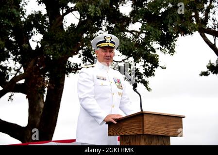 Rear Adm. Peter W. Gautier speaks during the Pacific Area change of ...