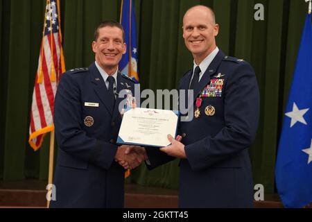 Col. Steven Anderson, former 688th Cyberspace Wing commander, exits his ...